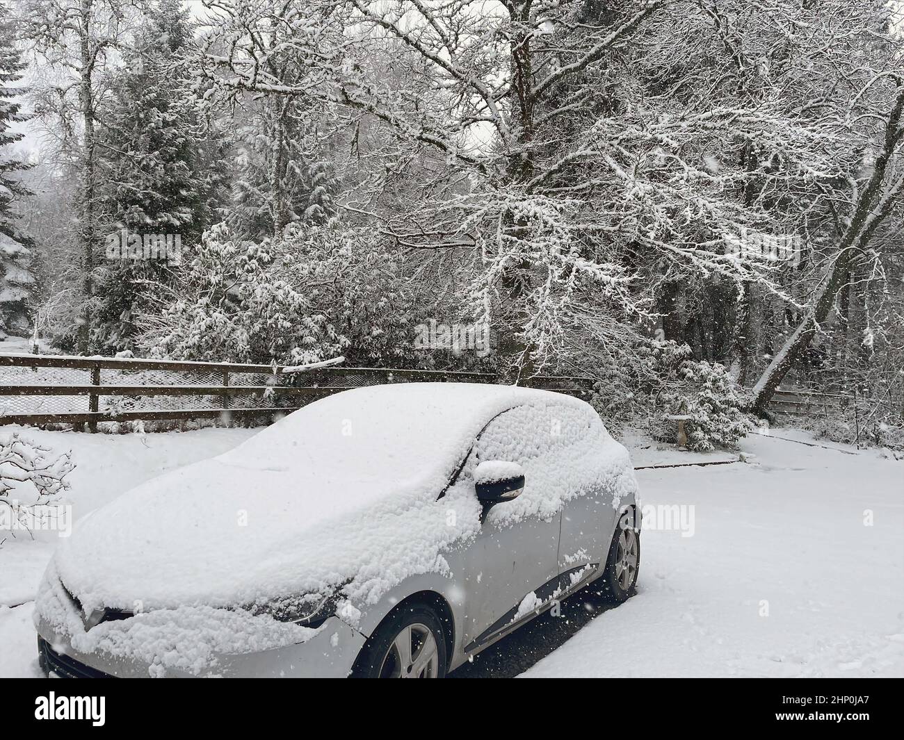 A car covered in snow near Huntly, Aberdeenshire, as Storm Eunice ...
