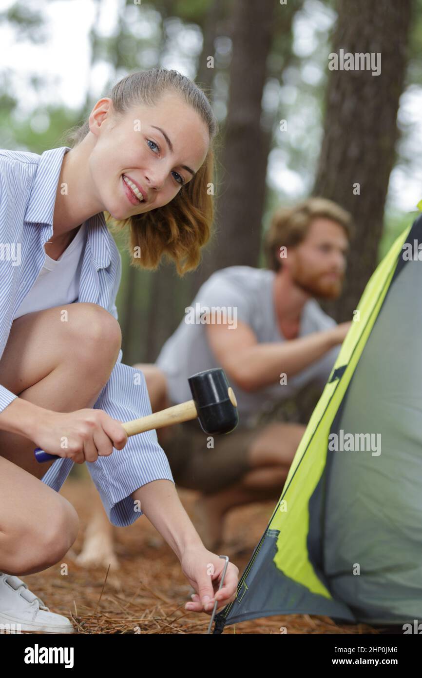 Tourist putting up tent hi-res stock photography and images - Alamy