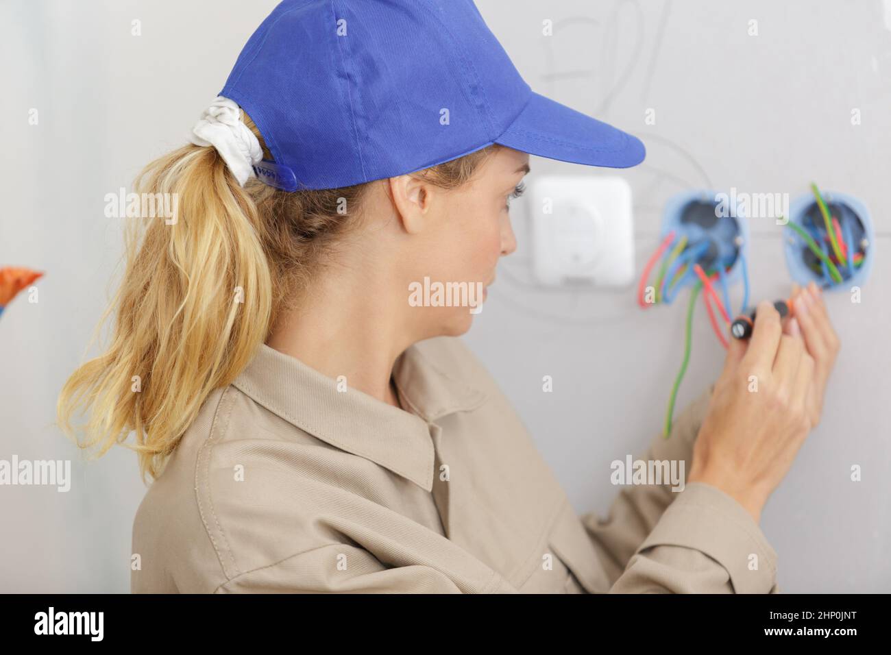 Fixing electricity problem hi-res stock photography and images - Alamy