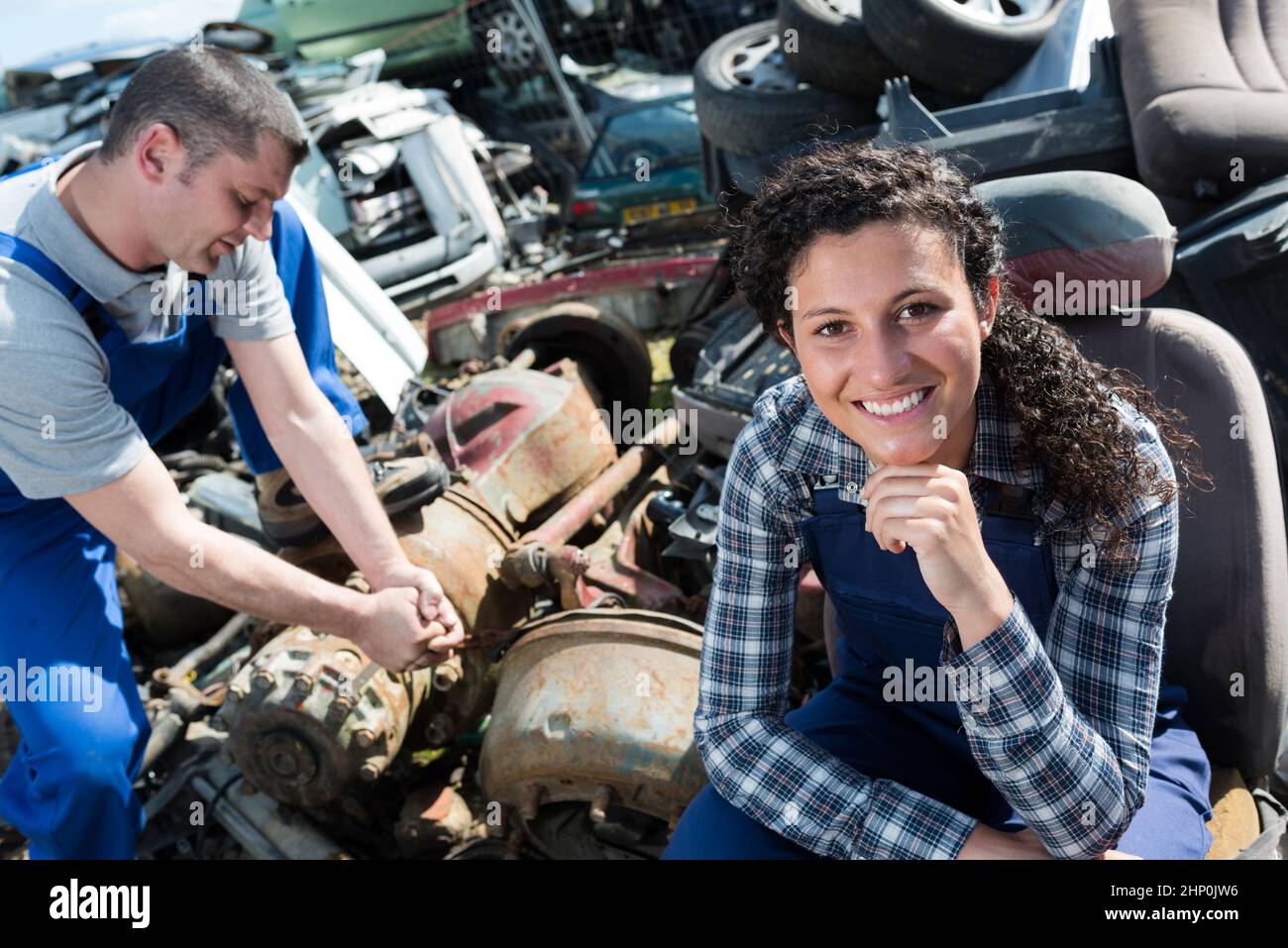 Young in junkyard hi-res stock photography and images - Alamy