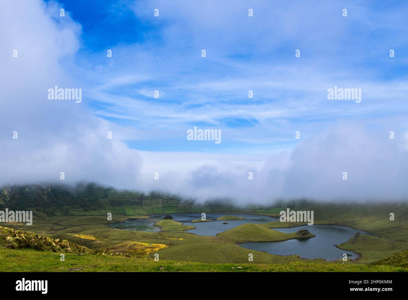 View of volcanic crater (Caldeirao) with a beautiful lake on the top of ...