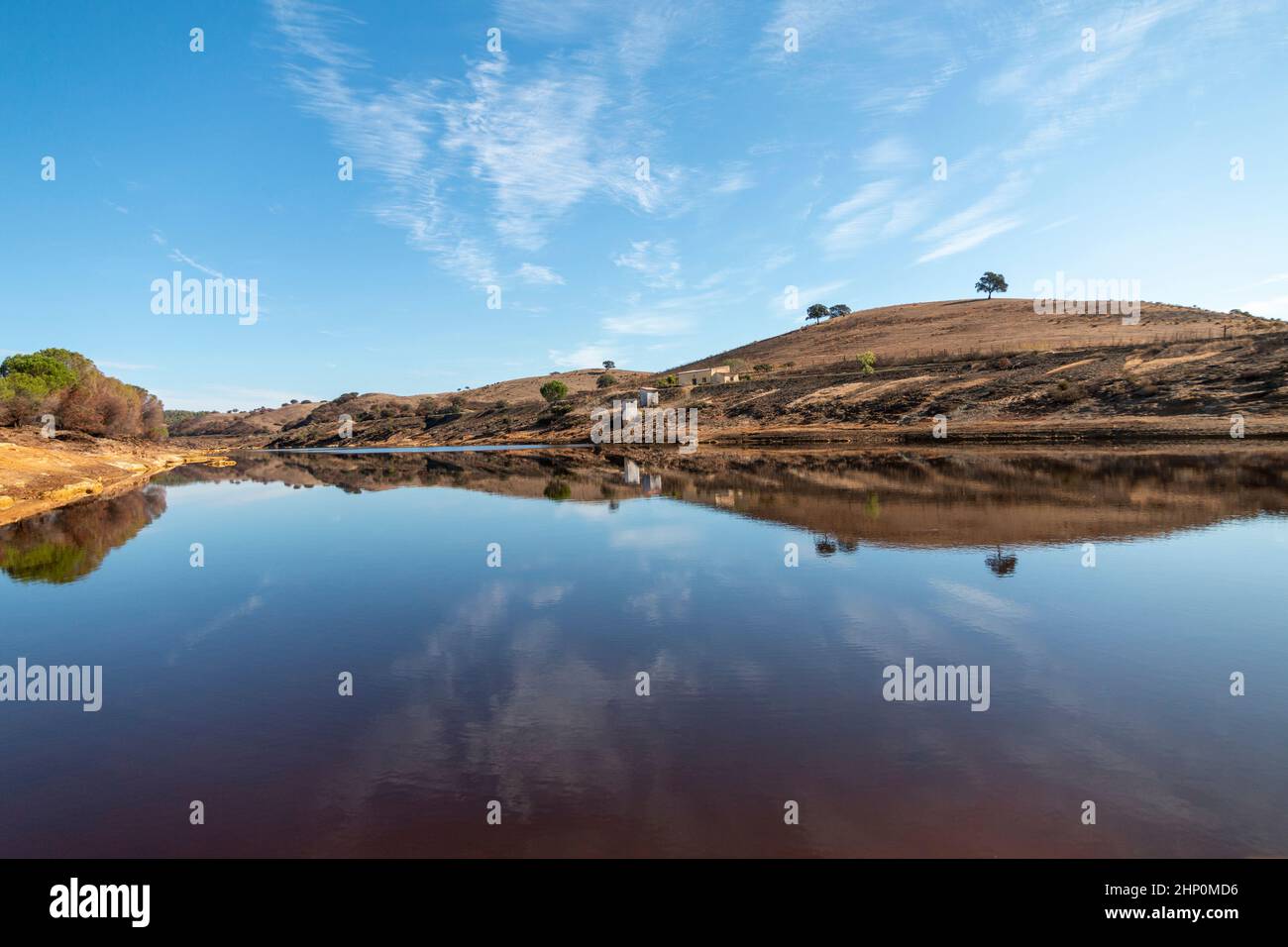 Landscape reflecting in the waters of the Rio Tinto, Huelva, Spain ...