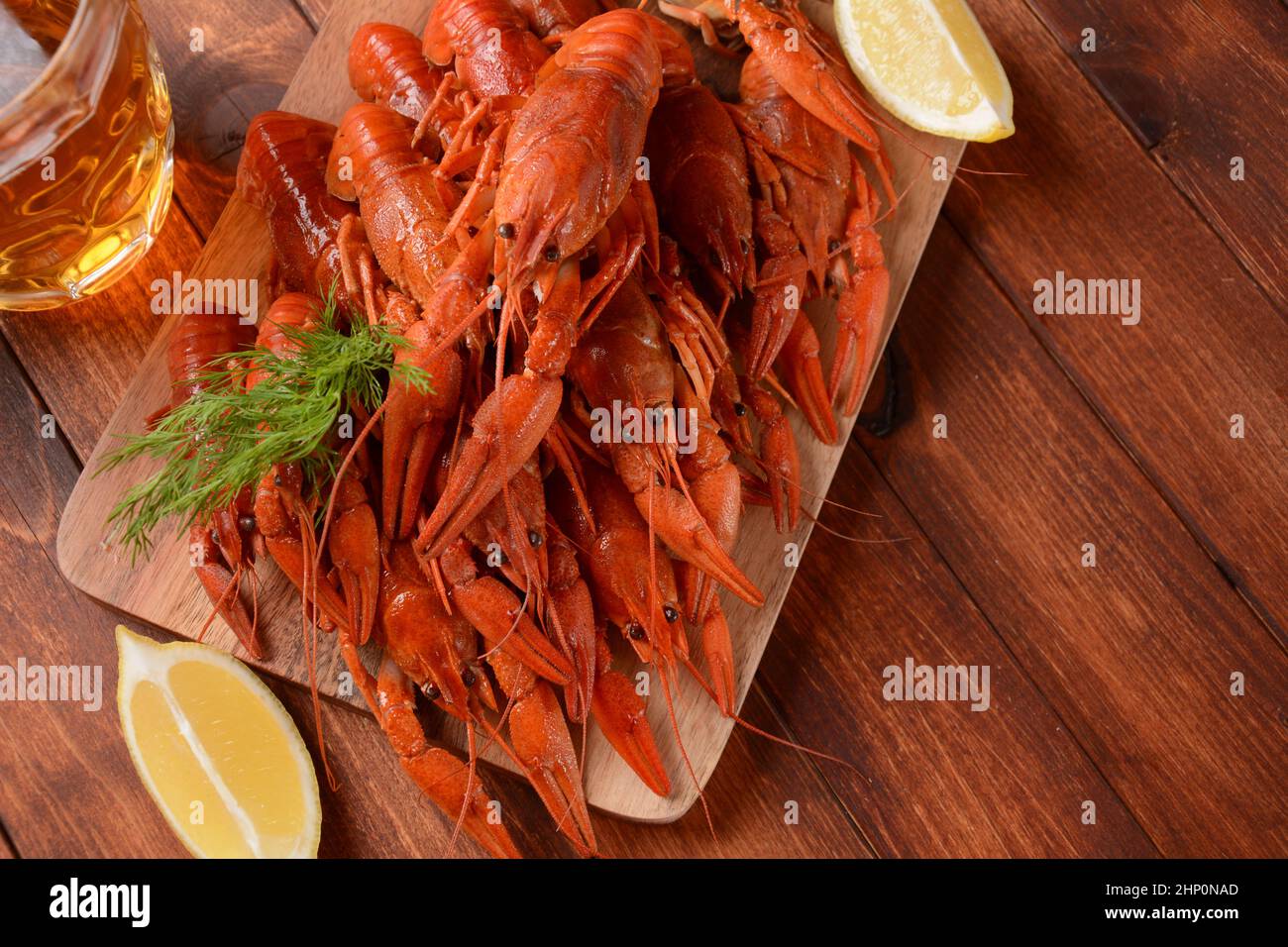 Red boiled crawfishes on table in rustic style. Asian Chinese Food ...