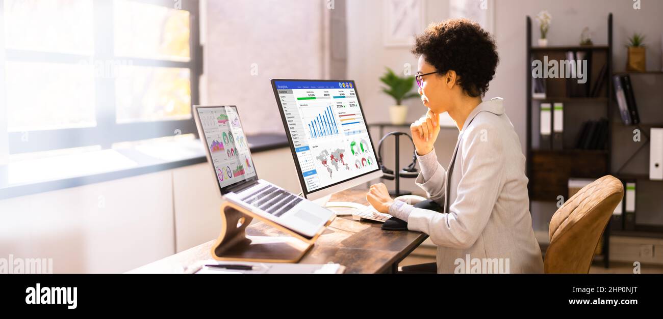 African American Business Data Analyst Woman Using Computer Stock Photo ...