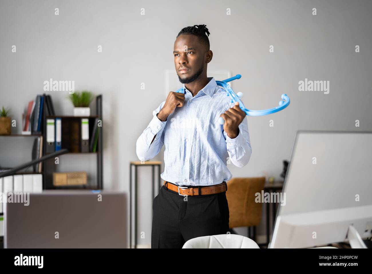 Man Using Muscle Hook For Trigger Point Massage Stock Photo - Alamy