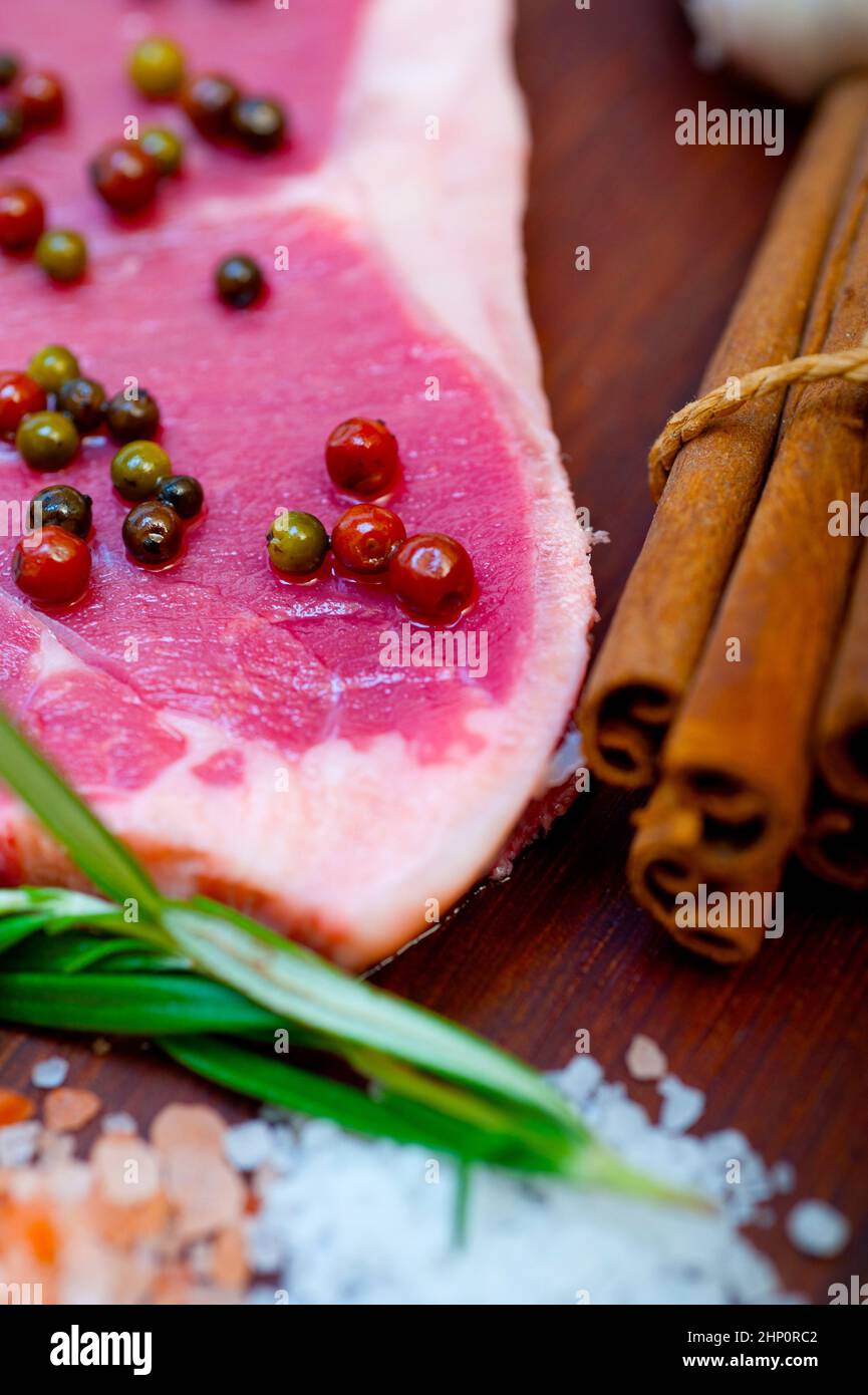 raw uncooked ribeye beef steak butcher selection Stock Photo - Alamy