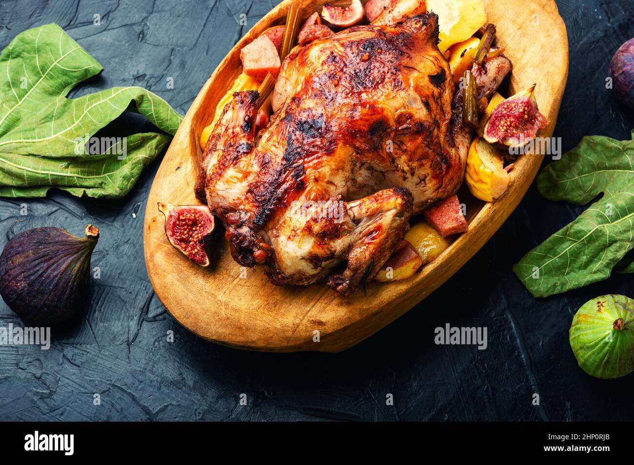Homemade chicken baked with figs. Autumn recipe Stock Photo - Alamy