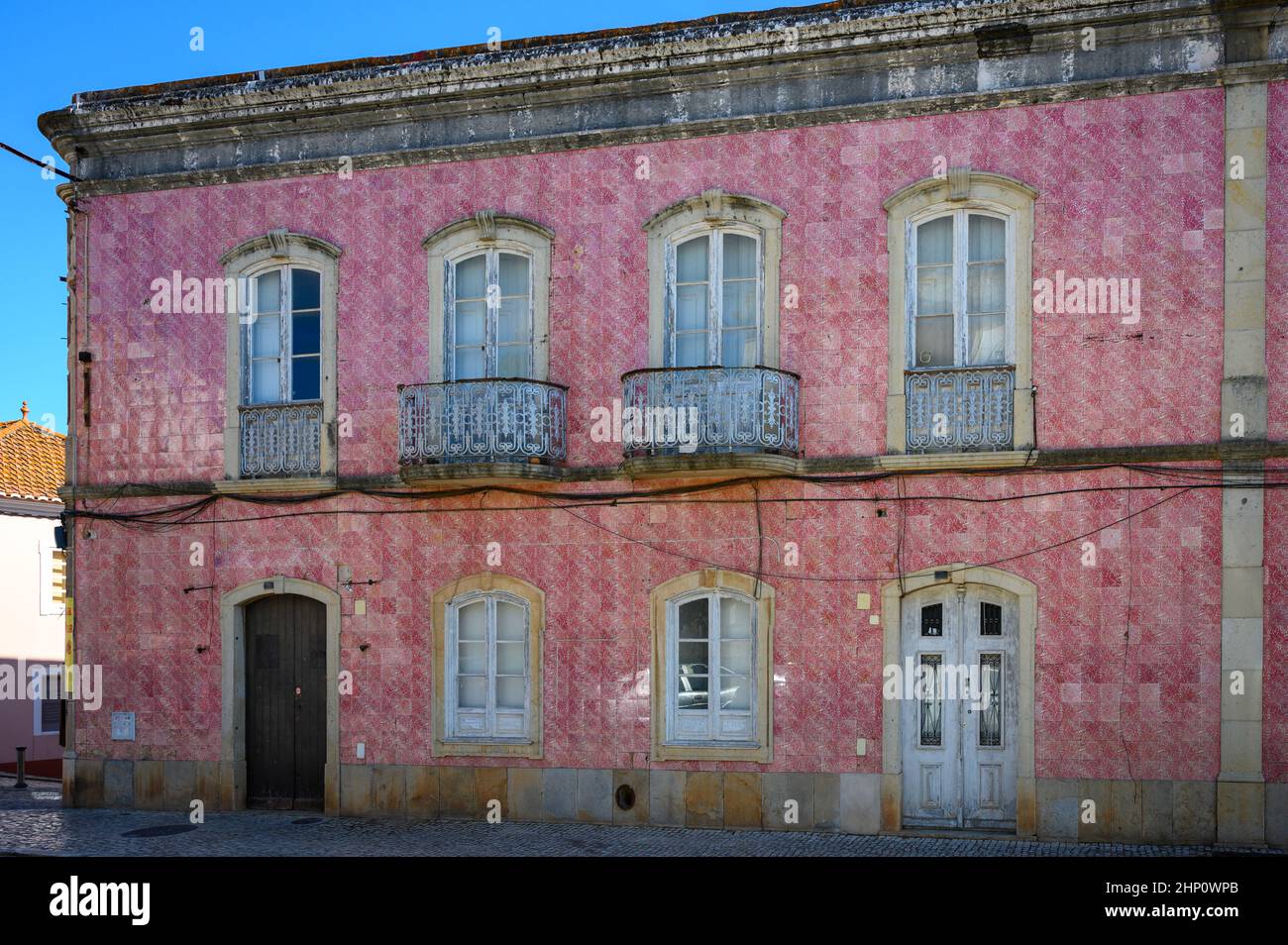 An old red-tiled house in a small Portuguese town Stock Photo - Alamy