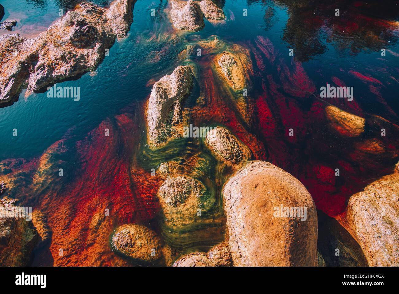 The 'Rio Tinto' river, in Huelva, Spain, whose waters dye the rocks of ...