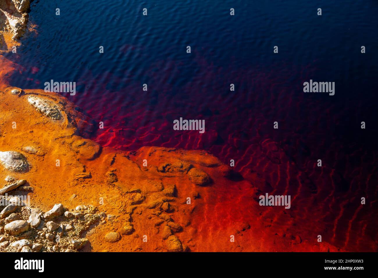 The 'Rio Tinto' river, in Huelva, Spain, whose waters dye the rocks of ...