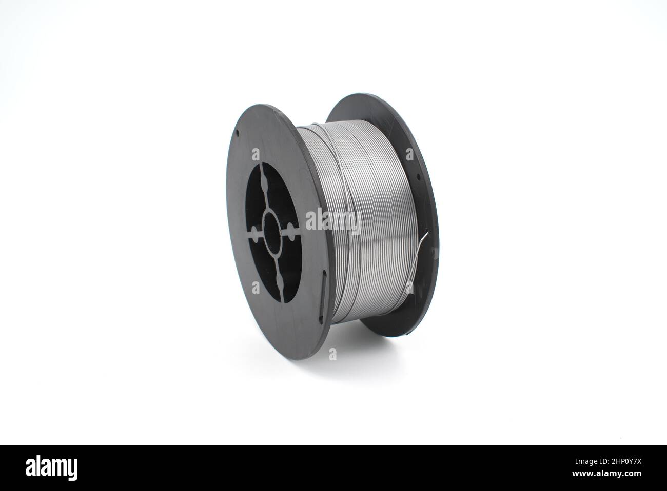 Flux cored welding wire for gasless welding isolated on white ...