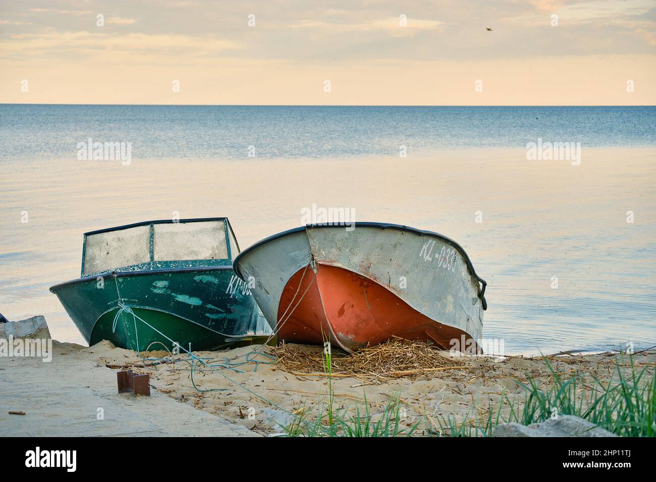 Two old metal boats on the seashore on the Curonian Spit of the ...