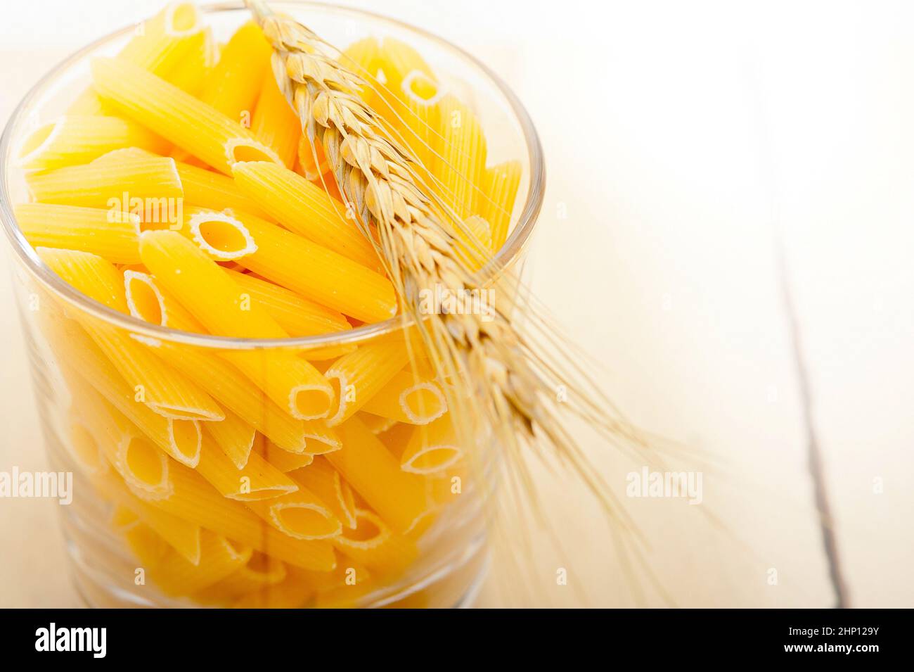 short Italian pasta penne with durum wheat grains Stock Photo - Alamy