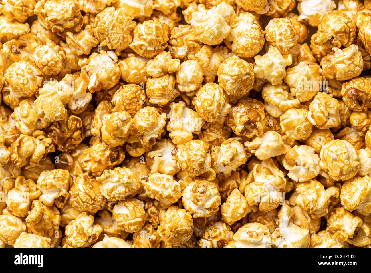 A lots of sweet caramel popcorn. Top view Stock Photo - Alamy