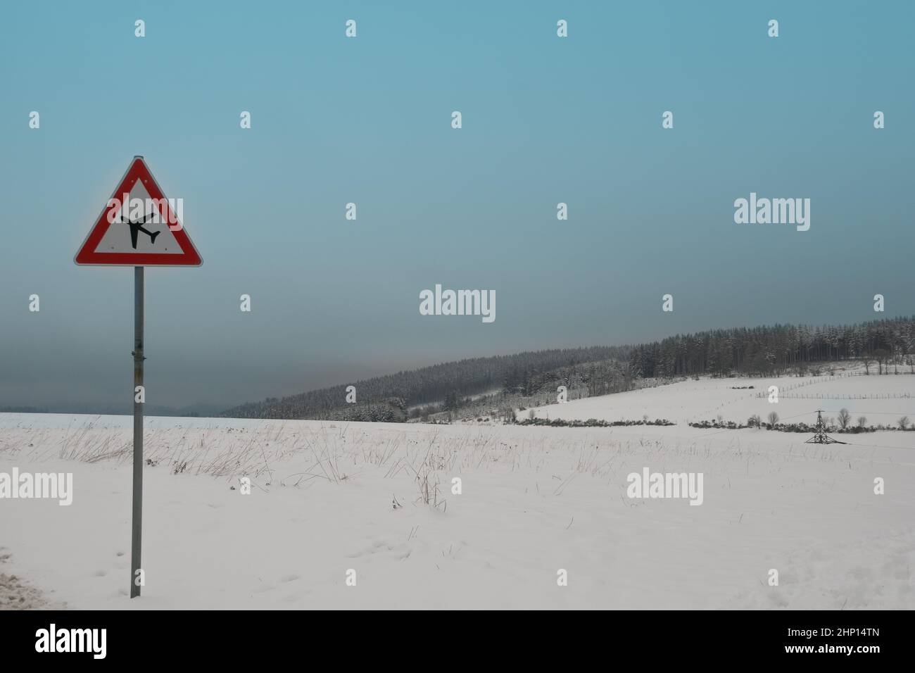 Flight warning sign at winter near the city Winterberg Stock Photo - Alamy