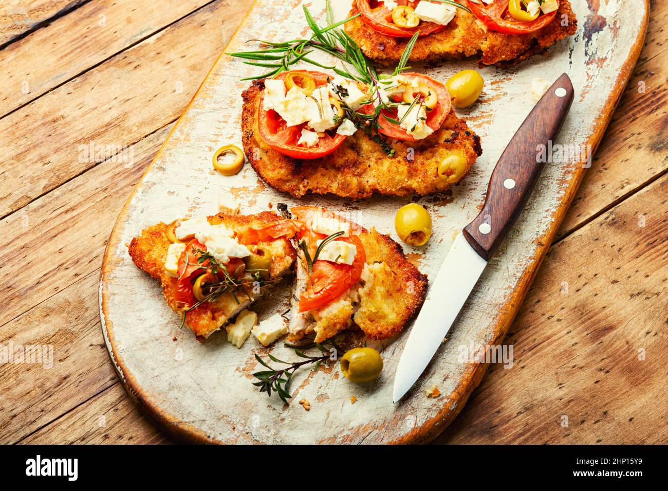 Schnitzel, breaded and fried thin layer of meat. Austrian dish ...