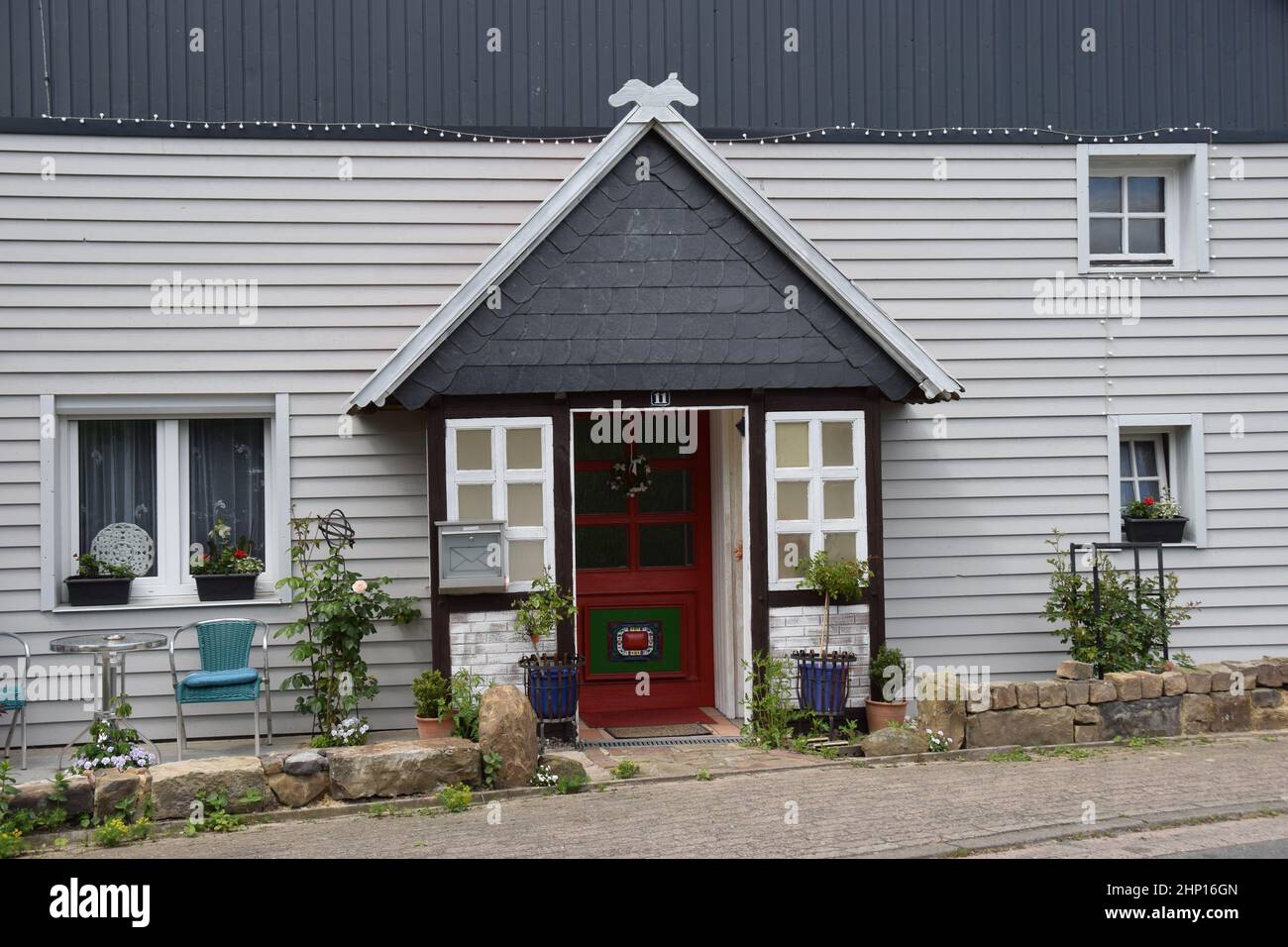 Cute, nostalgic house entrance Stock Photo - Alamy