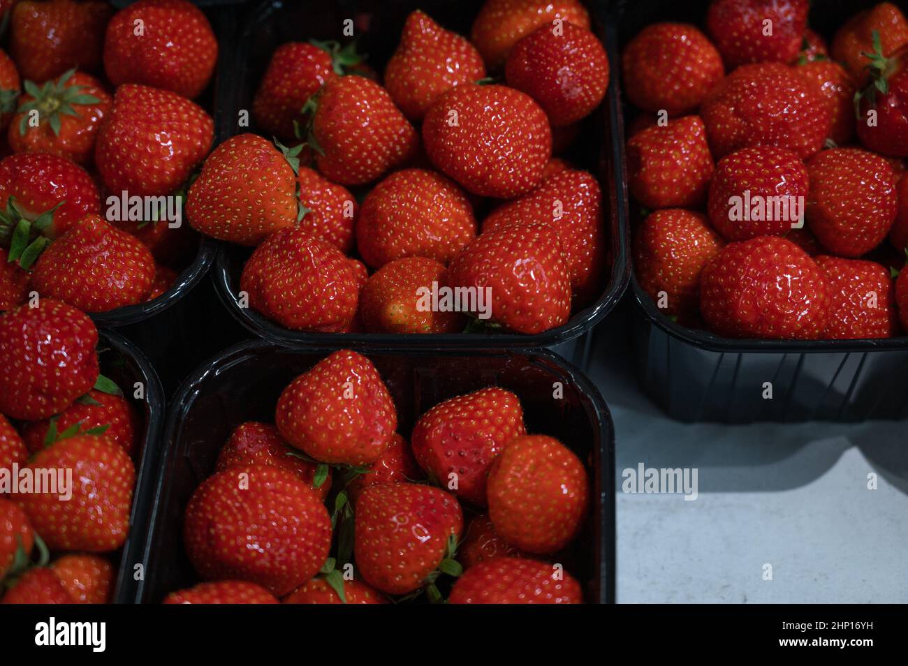 Assortment of fresh strawberry at market Stock Photo - Alamy