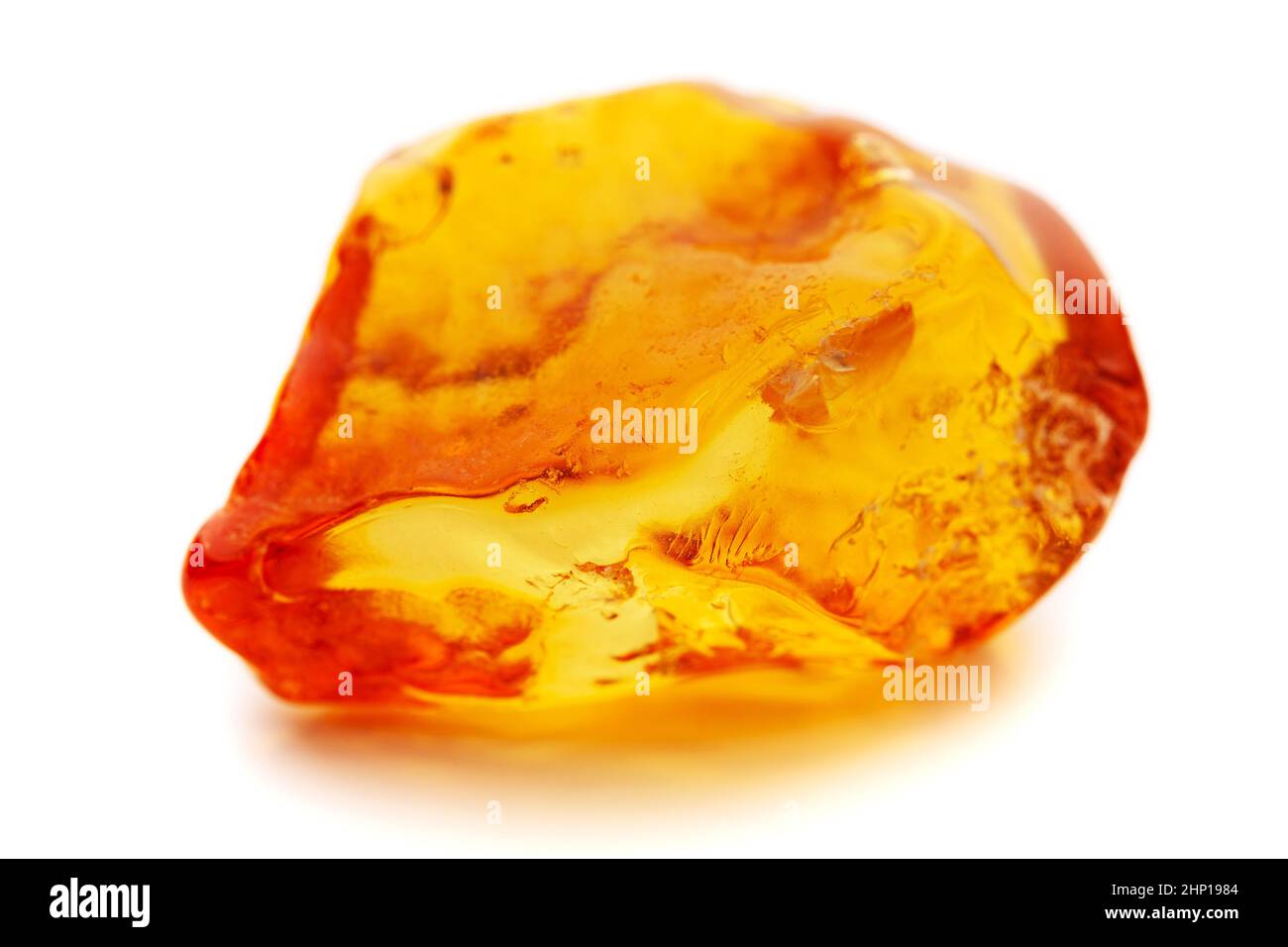 A piece of yellow opaque natural amber classification color Clear ...