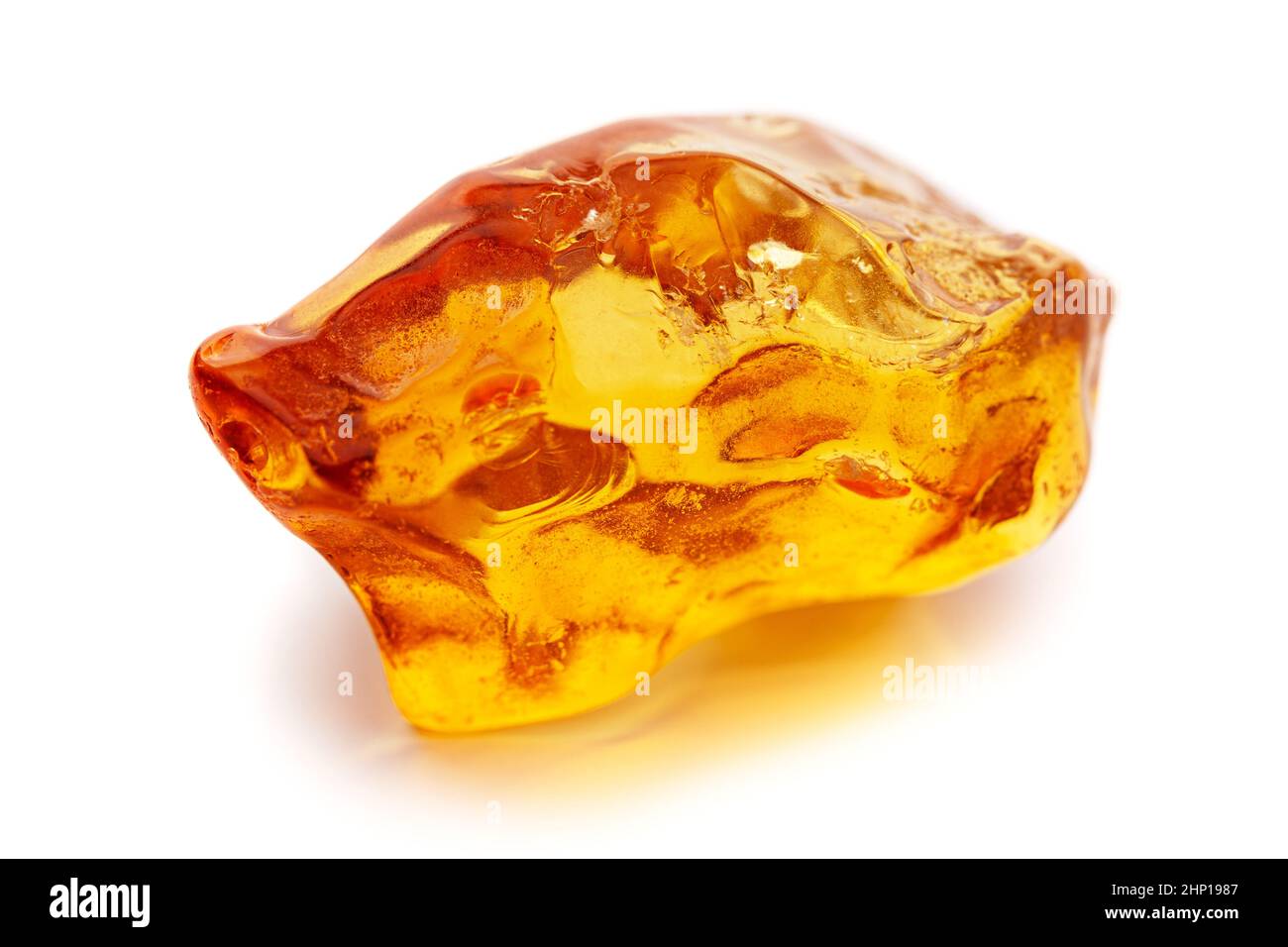 A piece of yellow opaque natural amber classification color Clear ...