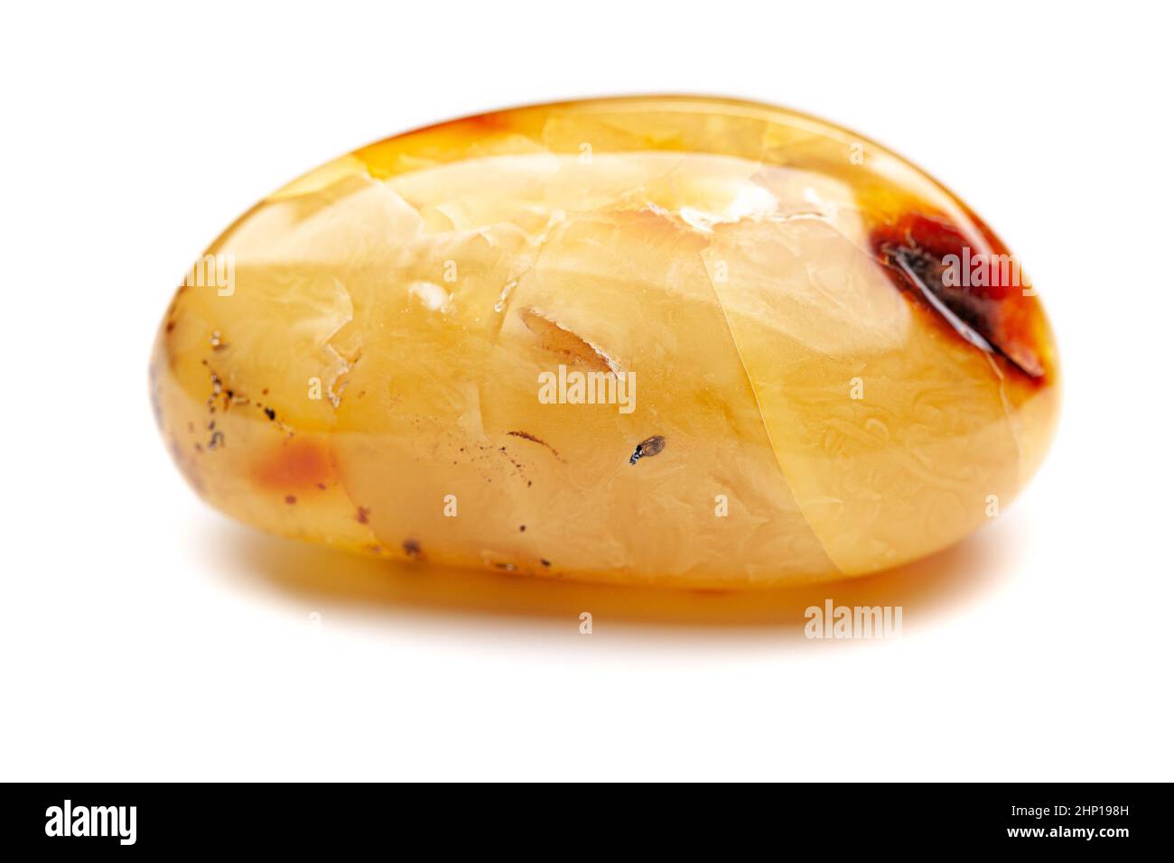 A piece of yellow opaque natural amber classification color Bastard ...