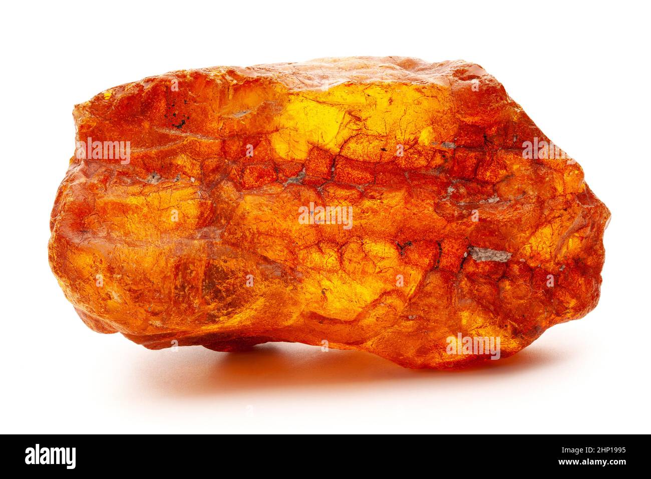 A piece of yellow opaque natural amber classification color Clear ...