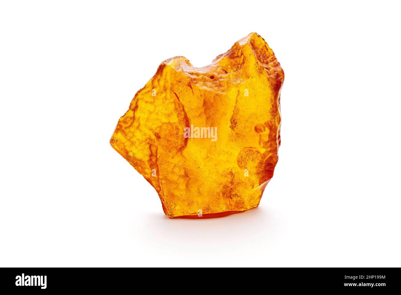 A piece of yellow opaque natural amber classification color Clear ...