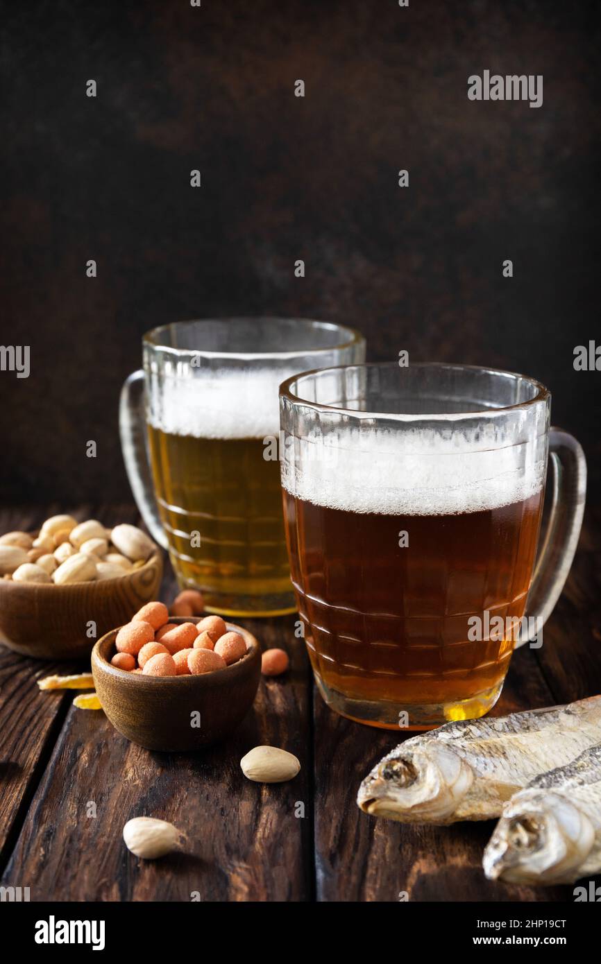 Alcohol drinkpint of lager and pint of stout, craft beer. Two Glass of ...