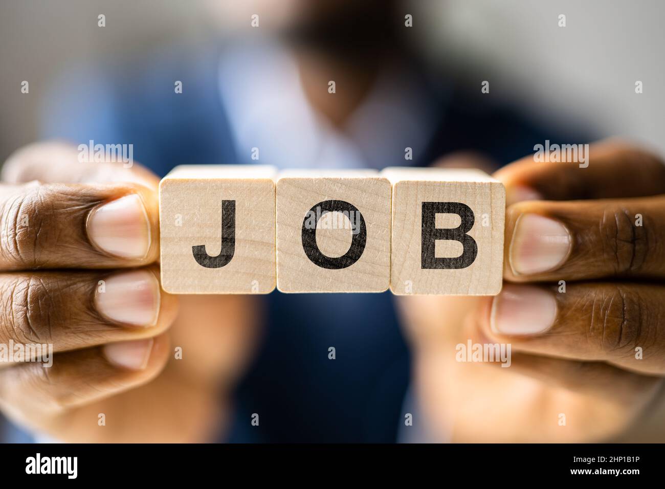 African American Career Job Seeker Holding Wooden Blocks Stock Photo ...