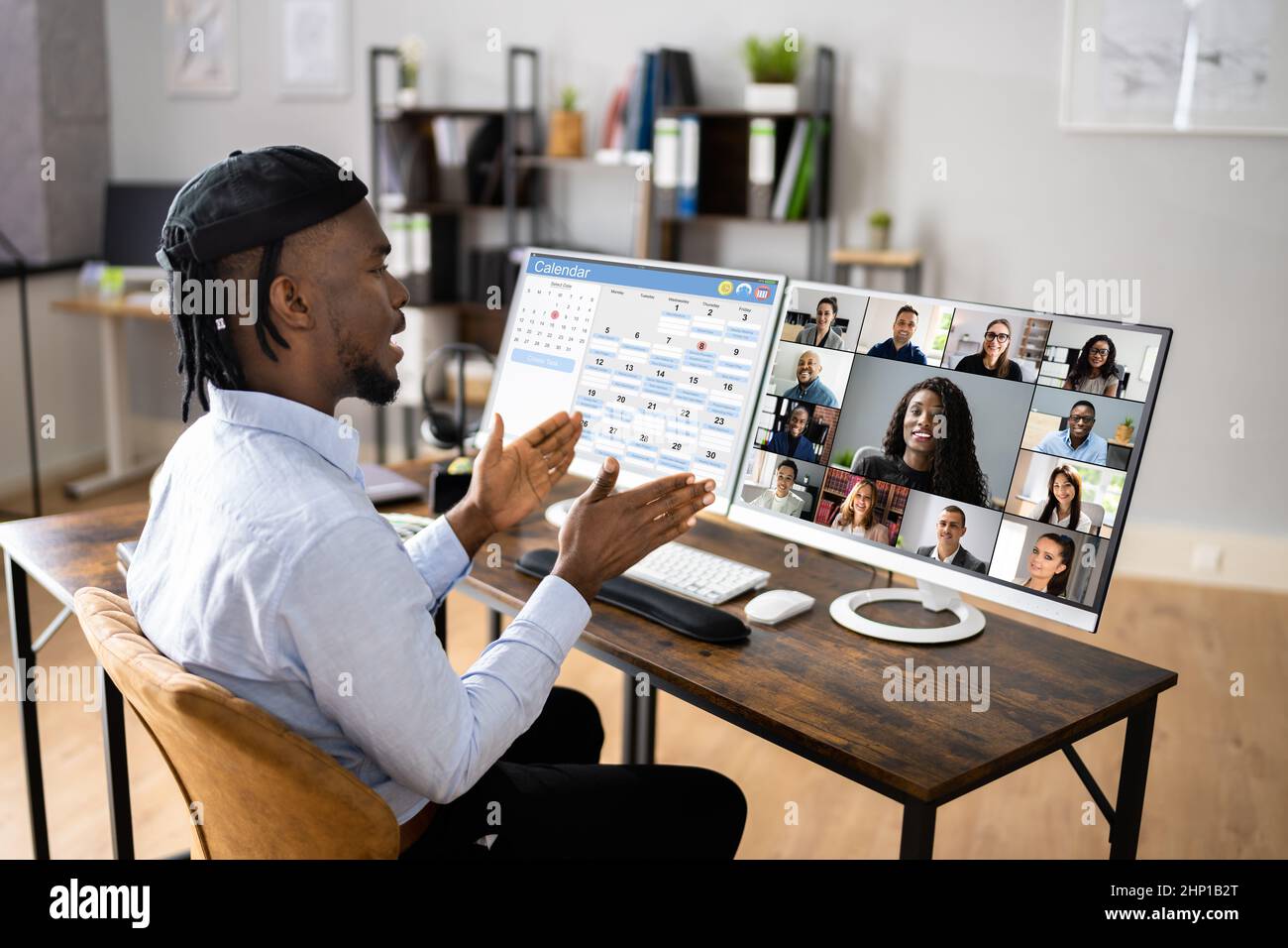 African Man Remote Telecommuting On PC Computer Stock Photo - Alamy