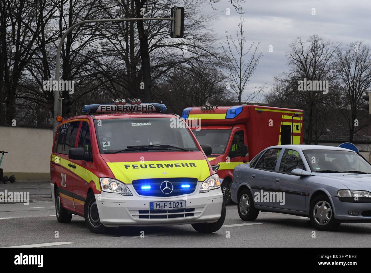Munich, Germany. 18th Feb, 2022. Fire engines drive in the direction of ...