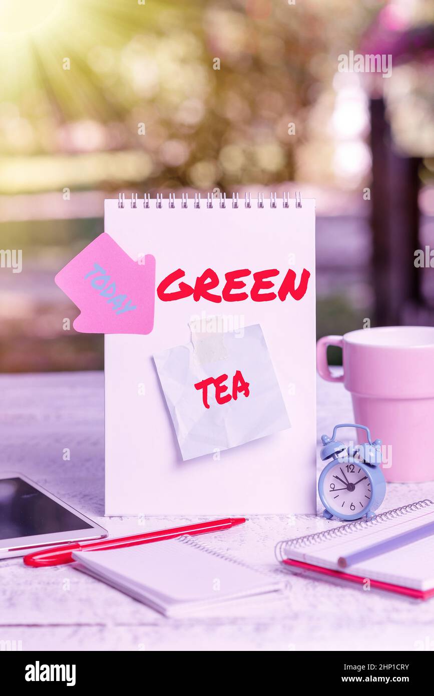 Writing displaying text Green Tea, Internet Concept type of tea that is ...