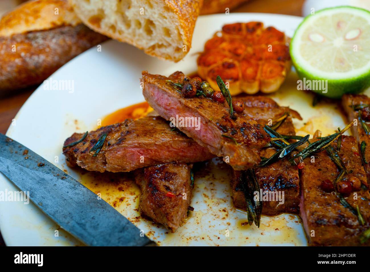 roasted grilled ribeye beef steak butcher selection Stock Photo - Alamy