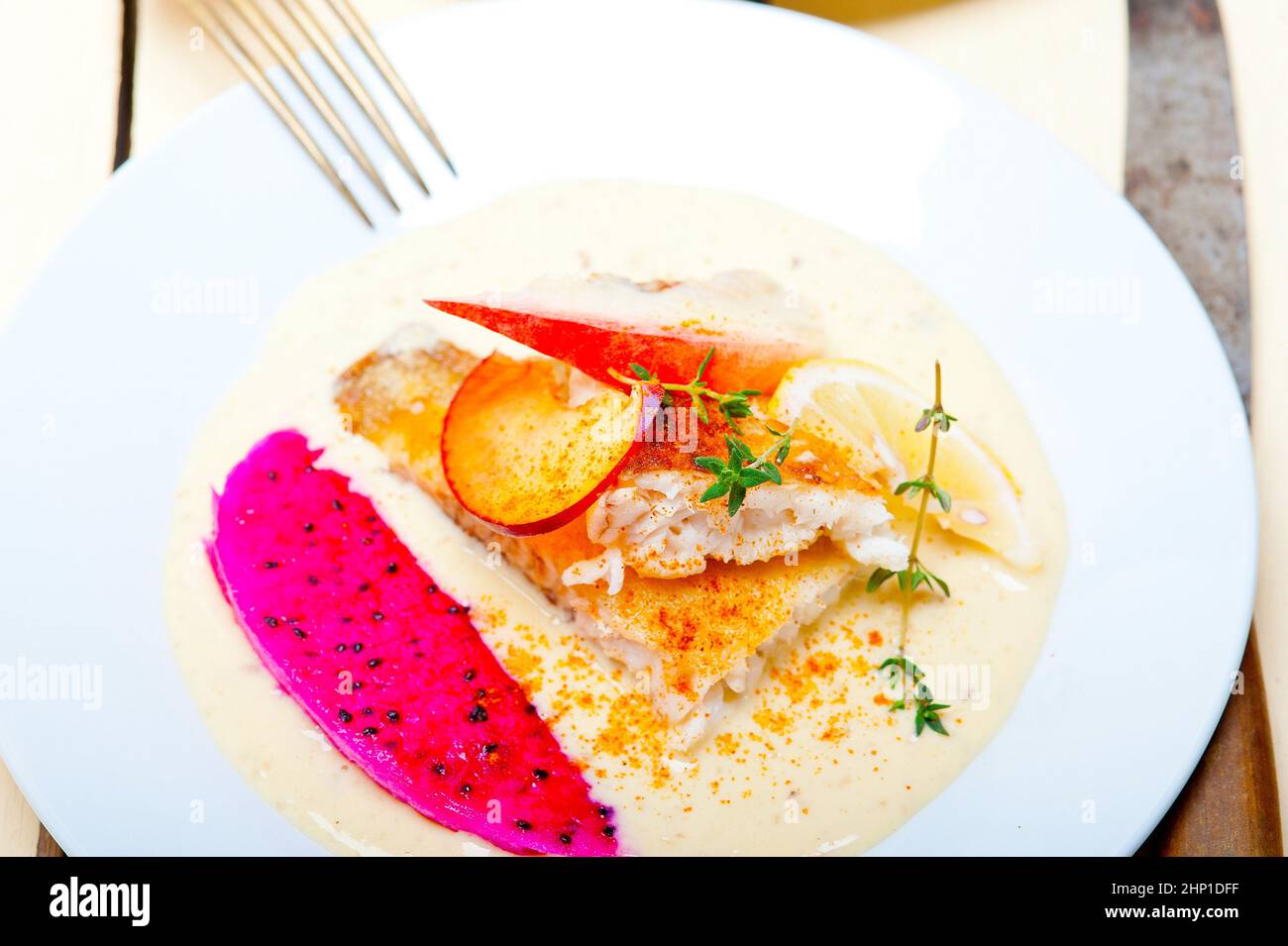 sea bream orata fillet butter pan fried with fresh peach prune and ...