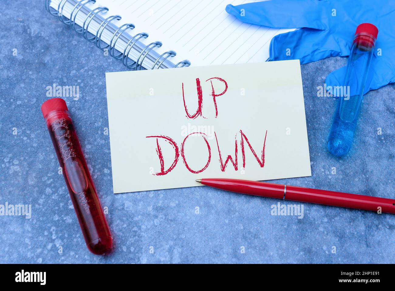 Writing displaying text Up Down, Business approach To look or to feel updown Look or to feel ...