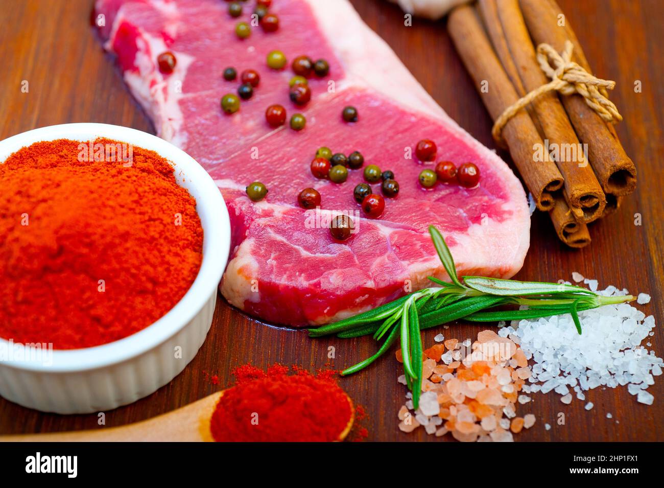 raw uncooked ribeye beef steak butcher selection Stock Photo - Alamy