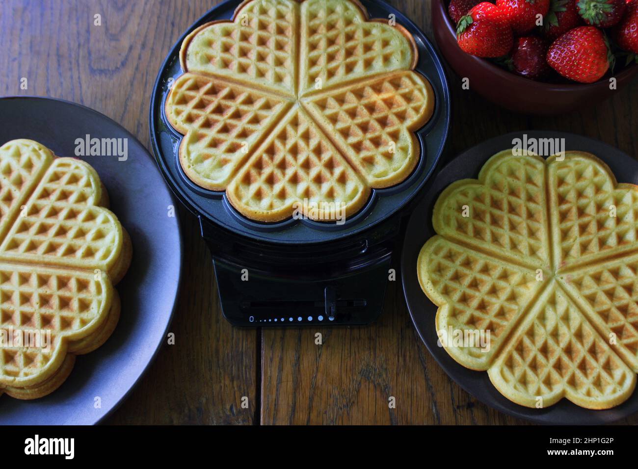 Chef finish making heart shape pancake with pan in kitchen Stock Photo ...