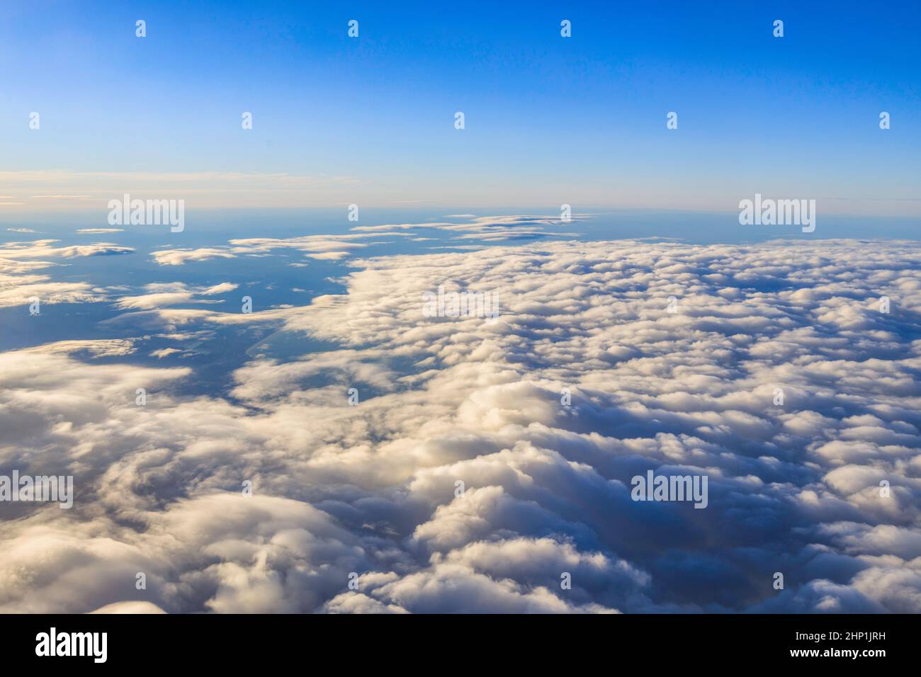 blue sky and clouds as seen through window of aircraft Stock Photo - Alamy