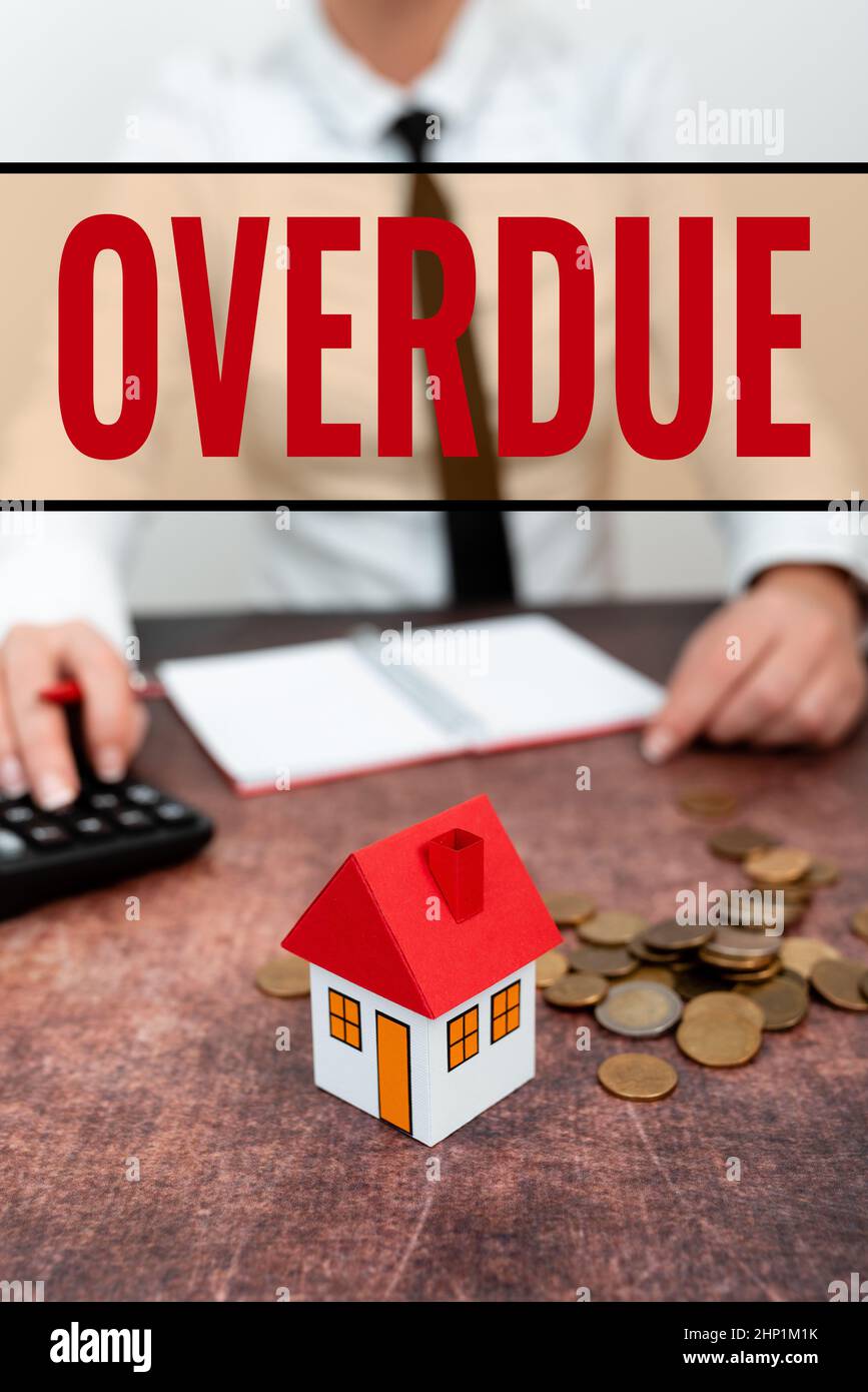 Hand writing sign Overdue, Word Written on loans and other obligations ...
