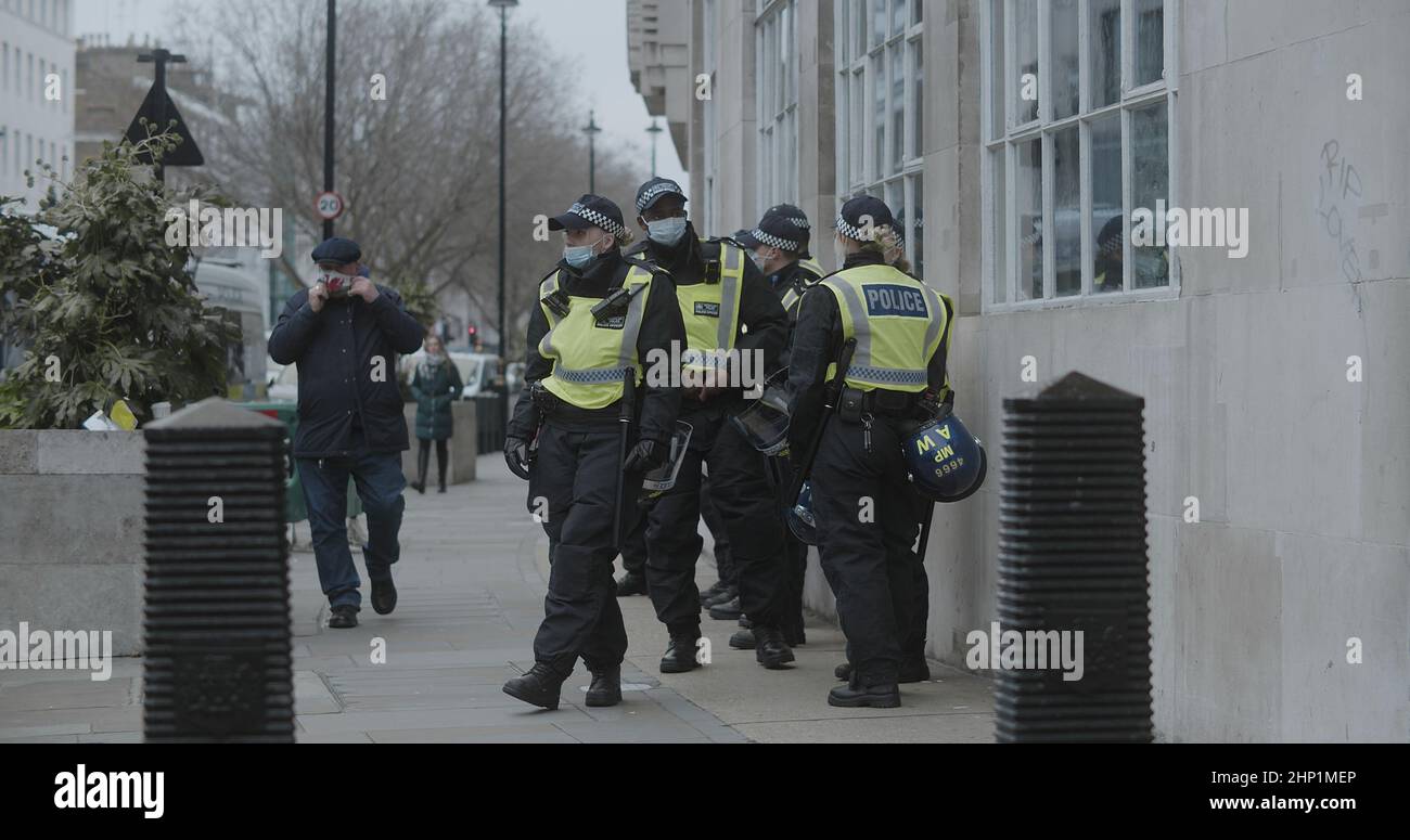 Female police officer standing hi-res stock photography and images - Alamy