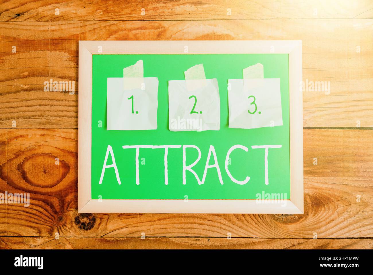 Hand writing sign Attract, Business overview to draw by a physical ...
