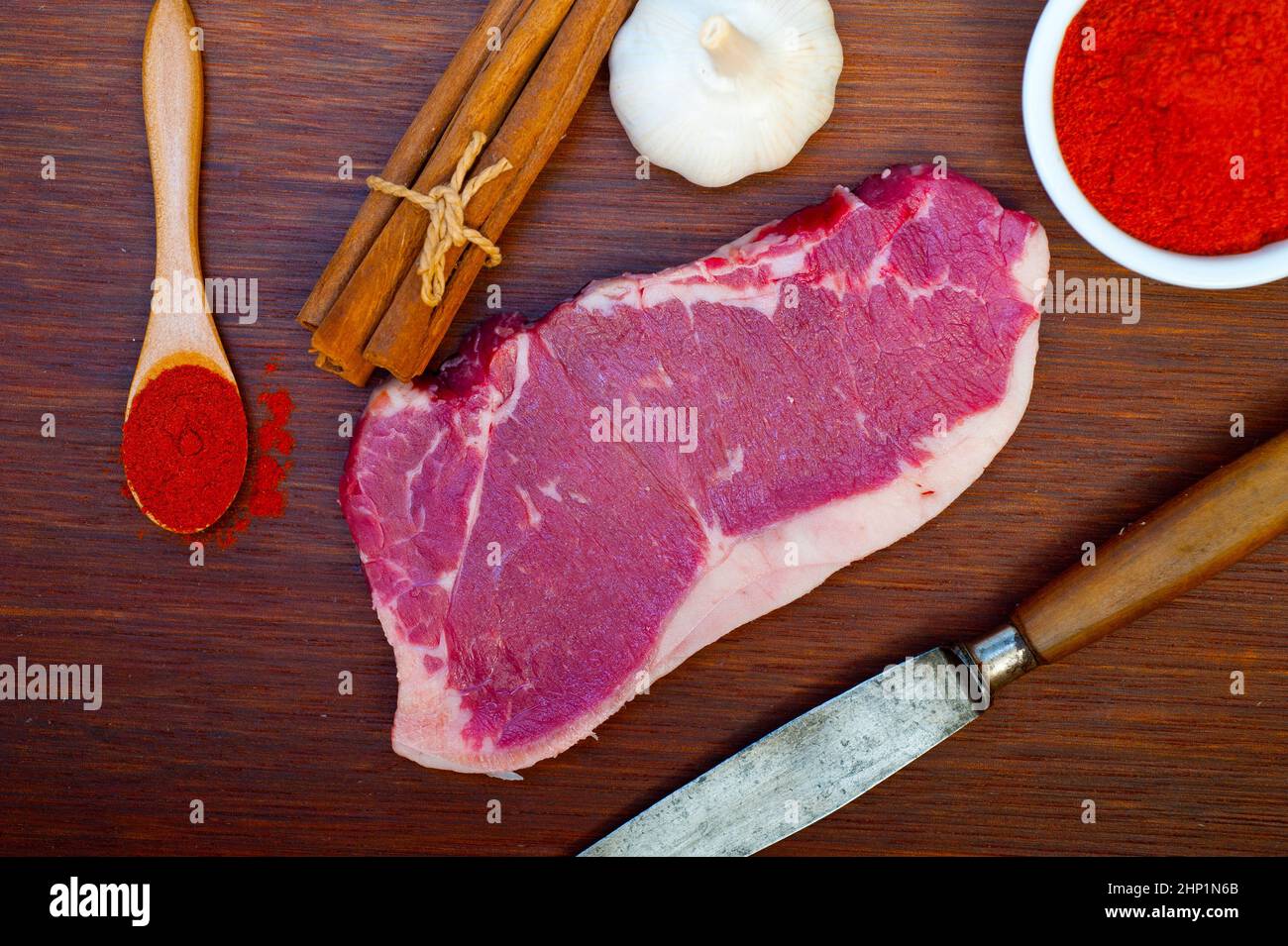 raw uncooked ribeye beef steak butcher selection Stock Photo - Alamy
