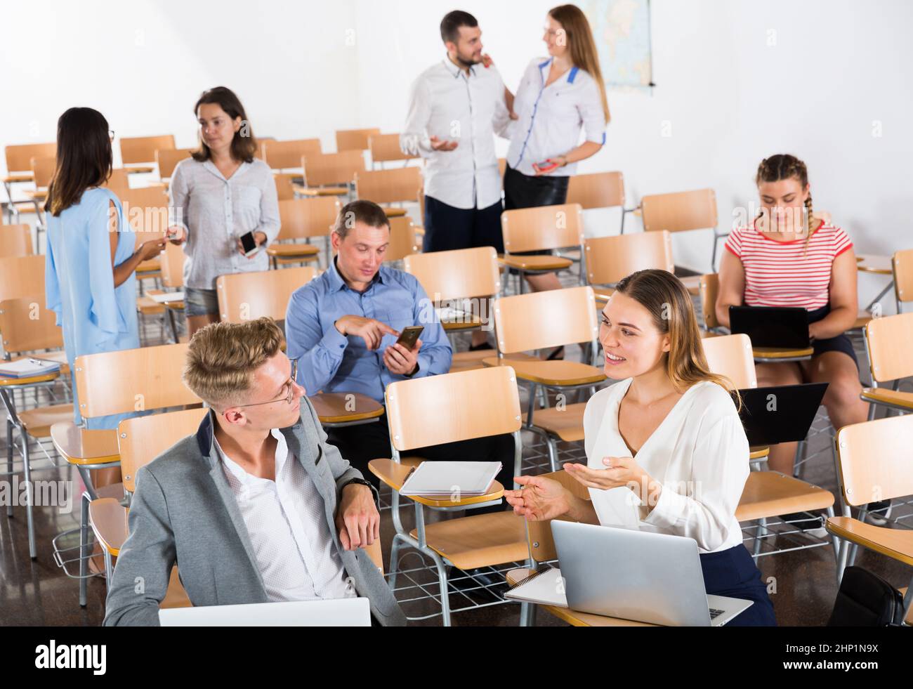 Students communicating during recess Stock Photo - Alamy