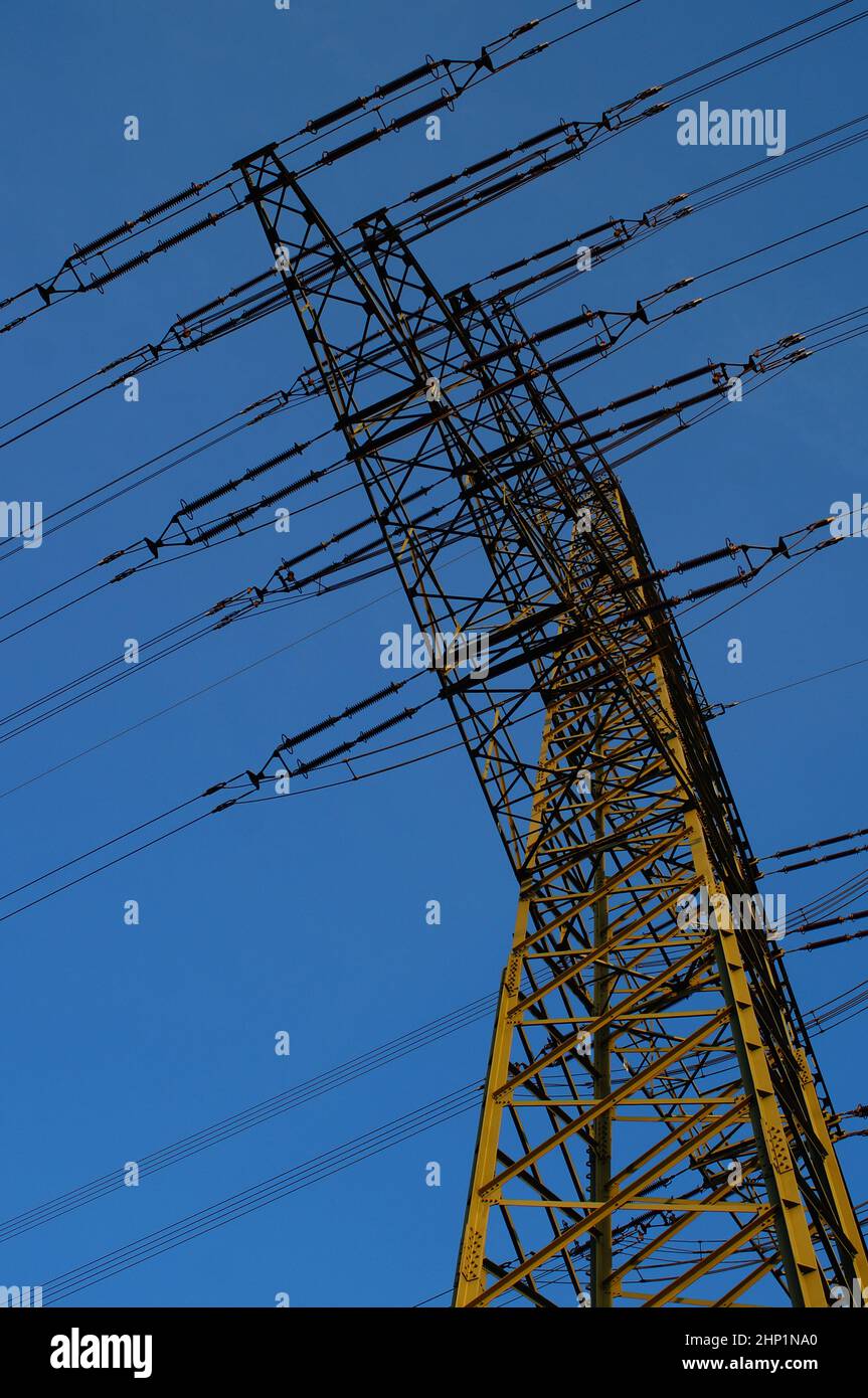 Silhouette of a high-voltage pylon in the blue evening sky Stock Photo ...