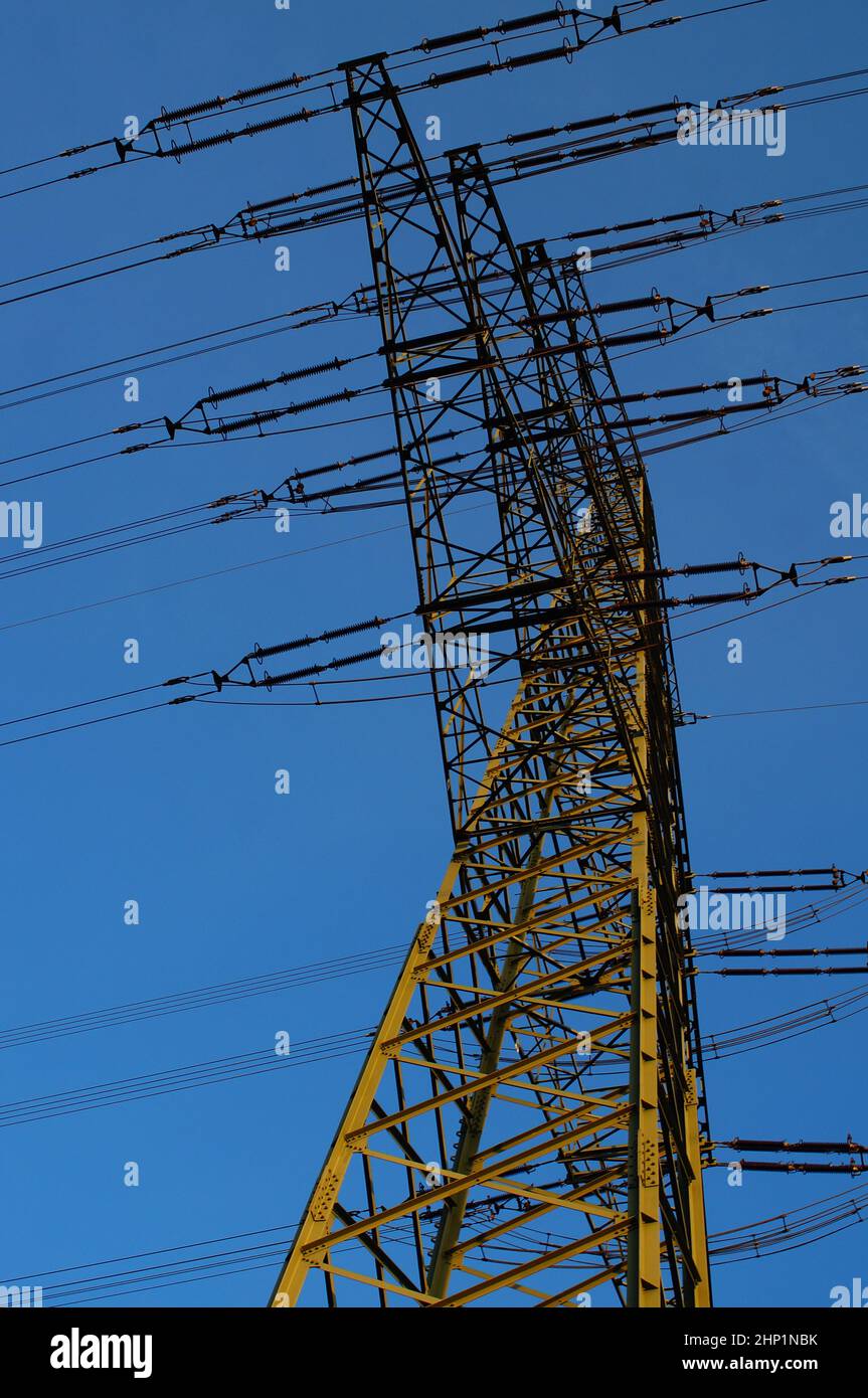 Silhouette of a high-voltage pylon in the blue evening sky Stock Photo ...