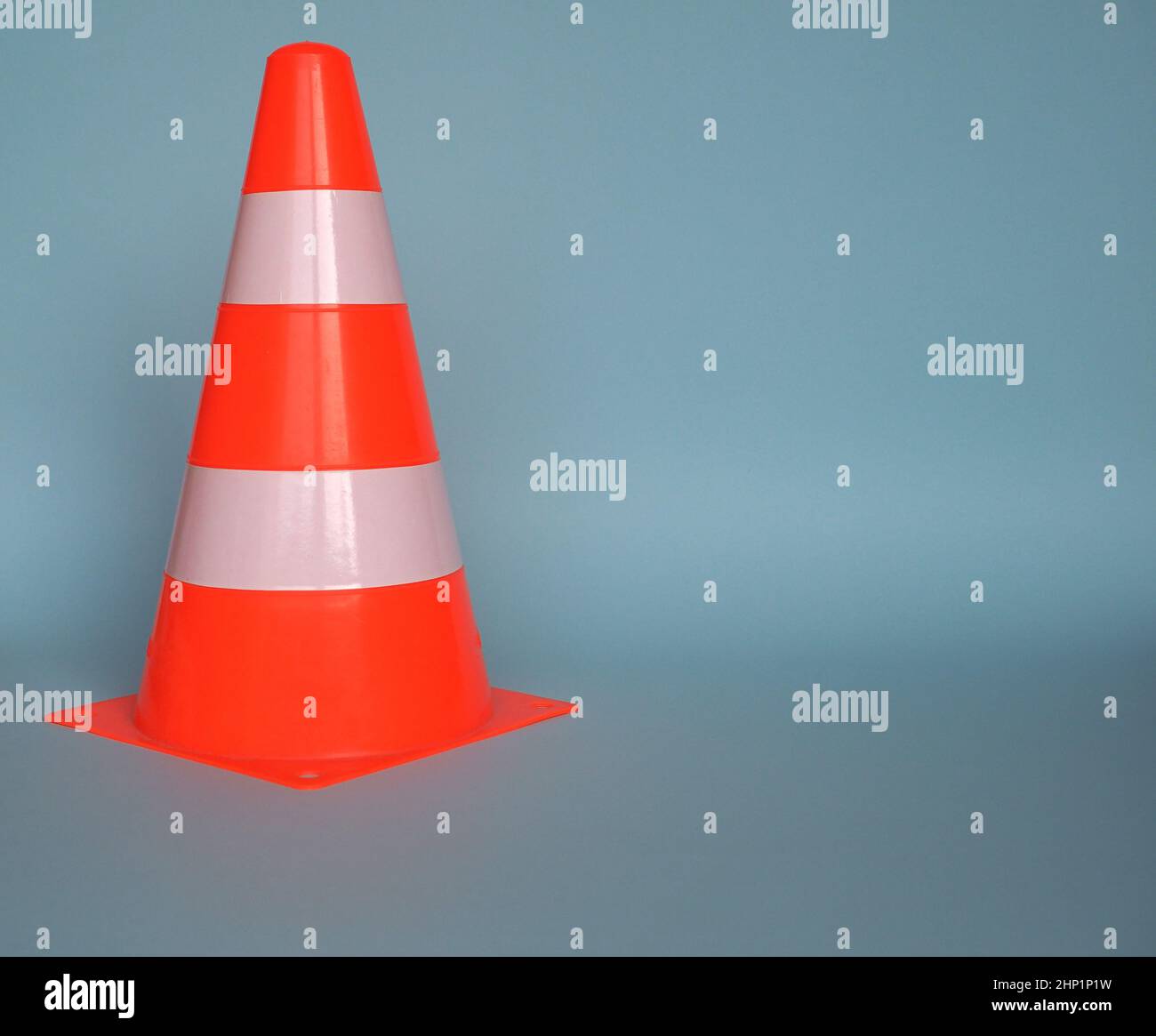 traffic cone to mark road works or temporary obstruction traffic sign ...