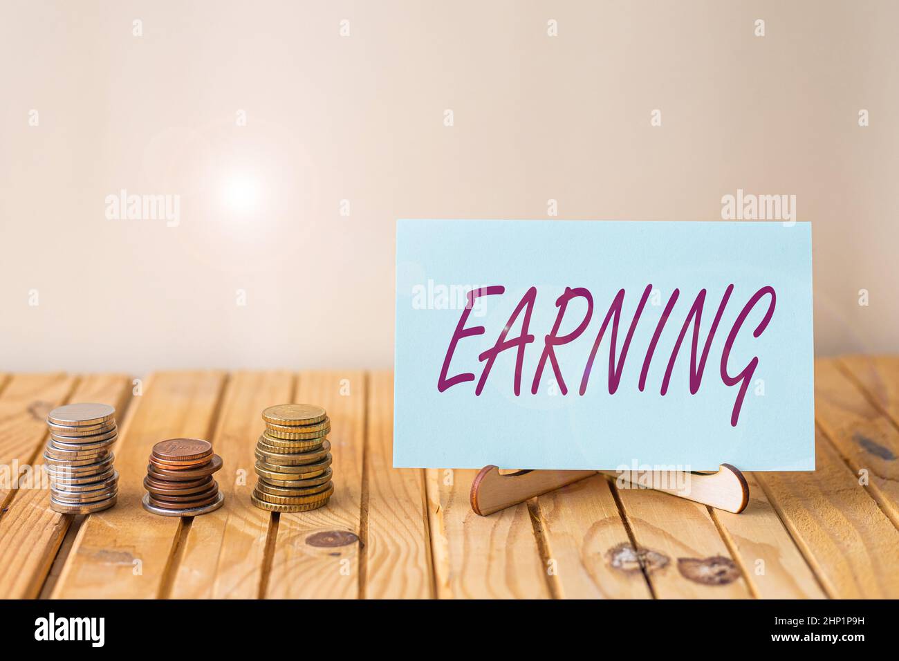 Writing displaying text Earning, Conceptual photo something earned as ...