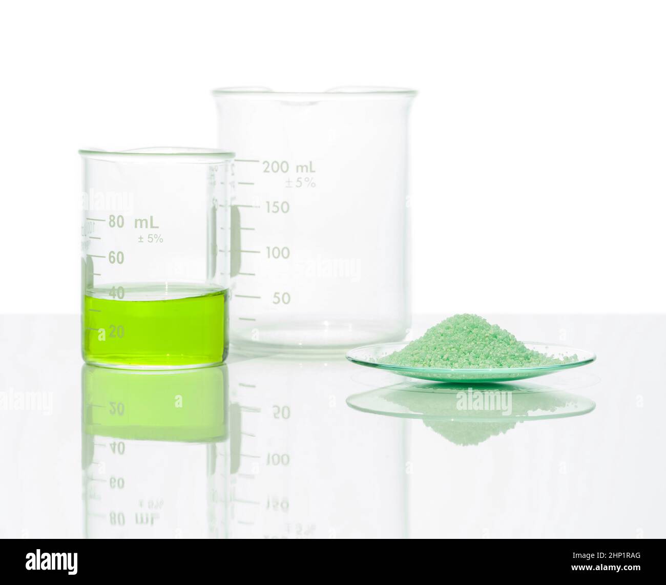 Ferrous Sulfate in Chemical Watch Glass place next to Iron (II) sulfate ...