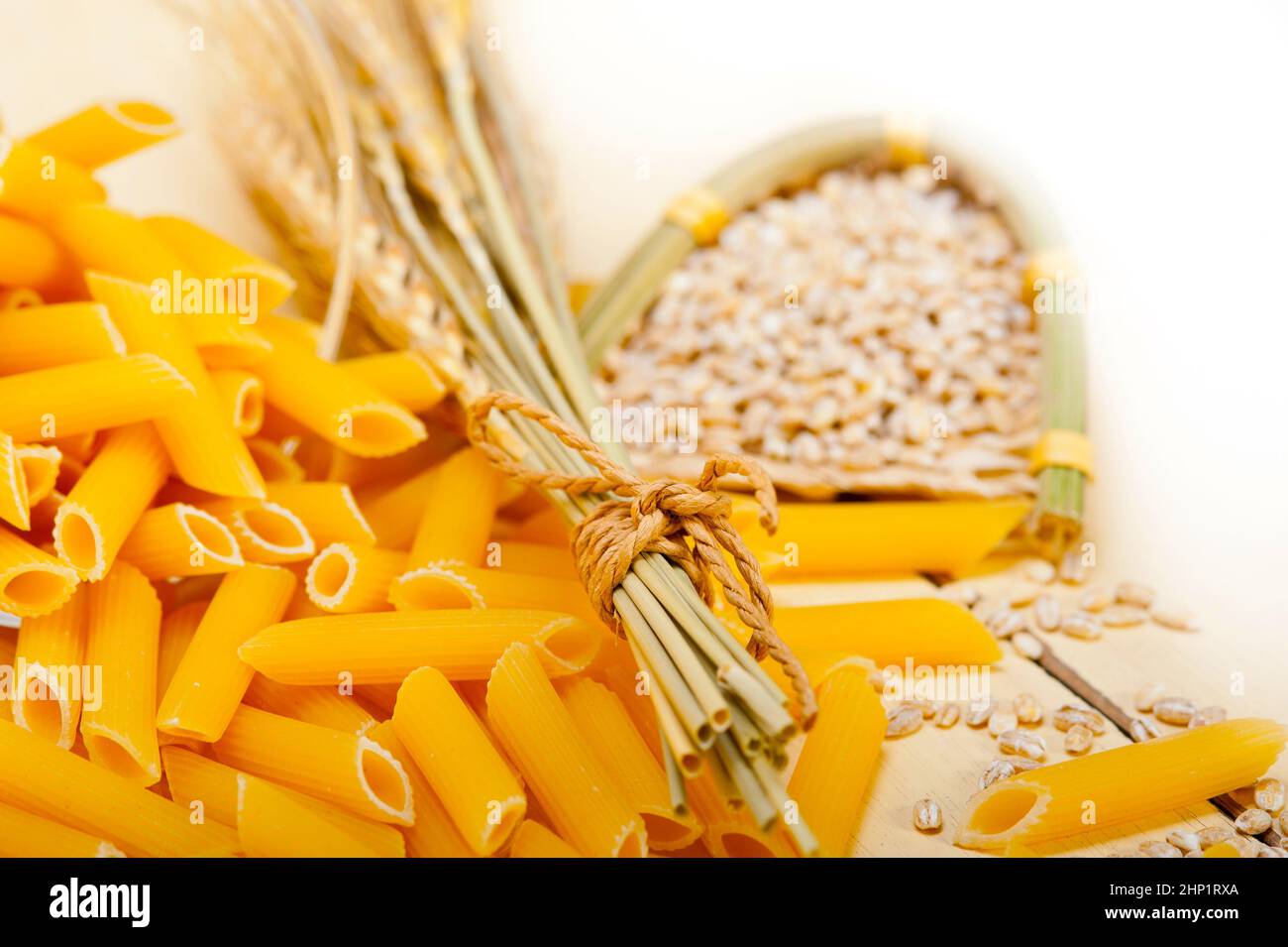 short Italian pasta penne with durum wheat grains Stock Photo - Alamy