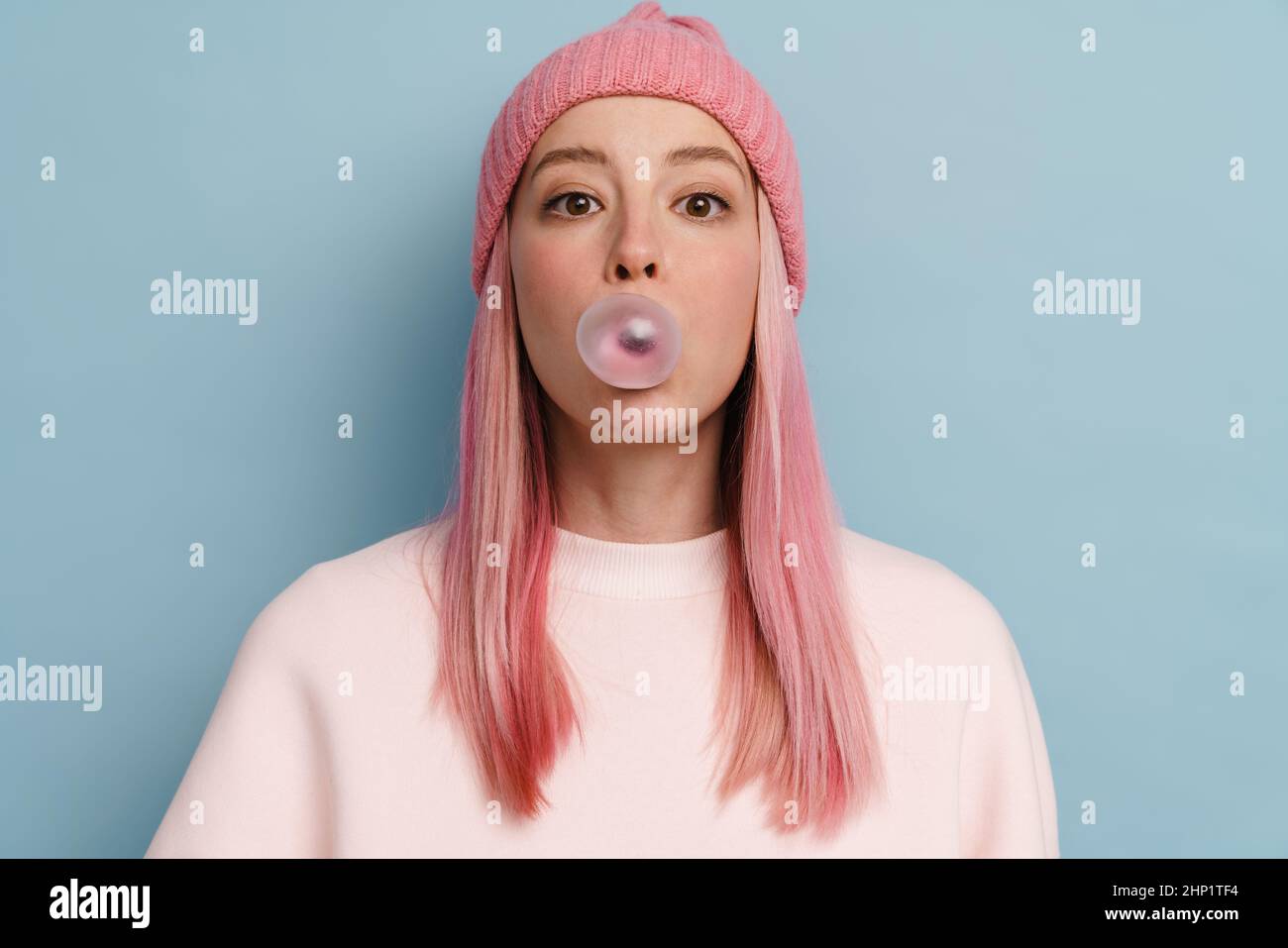 Blowing bubble gum studio hi-res stock photography and images - Alamy